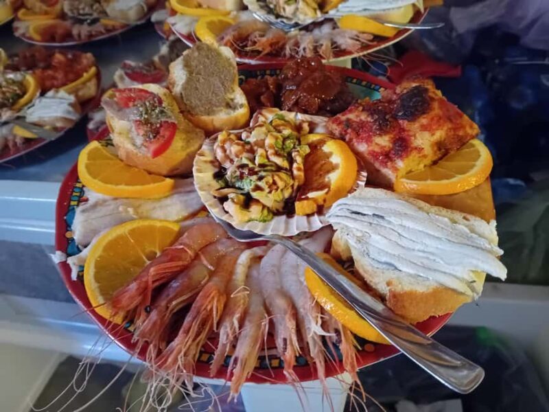 Lampedusa: Boat Cruise with Swimming Stops and Italian Lunch - Key Points