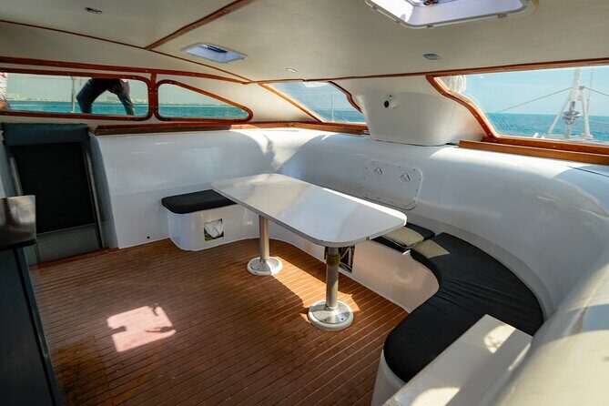 Laura Catamaran Private Tour to Isla Mujeres - Key Points  