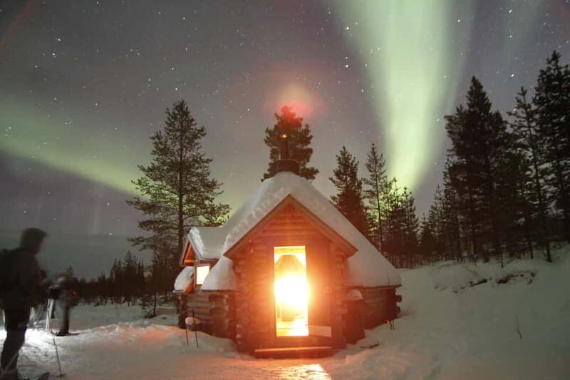 Levi: Evening Snowshoe Walk Under Northern Sky - Cozy Breaks and Warmth in the Arctic Night