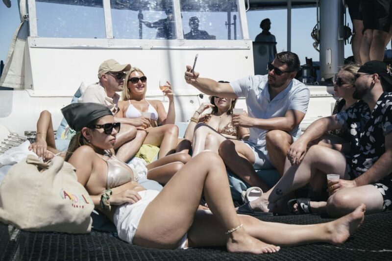 Lisbon: Catamaran Boat Party with Music, Open Bar & Dives - Practical Tips for Your Trip