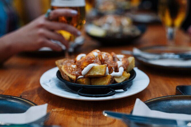 Lisbon Gastronomic Food Tour with Wine in Baixa - Key Points