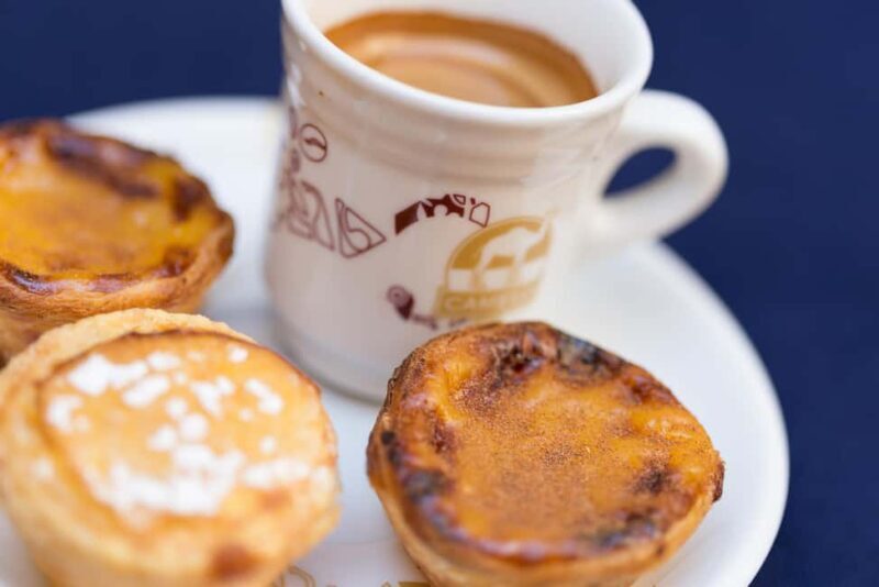 Lisbon Hidden Gems Walk: Traditions, Lunch & Ferry Ride - Iconic Views and the Castle