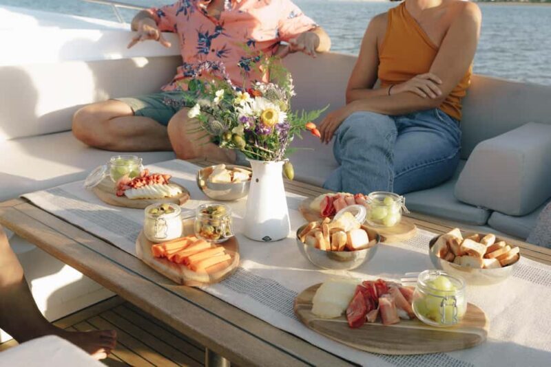 Lisbon Sunset Boat Tour with local Snacks & Drinks - The Intimate, Authentic Experience  