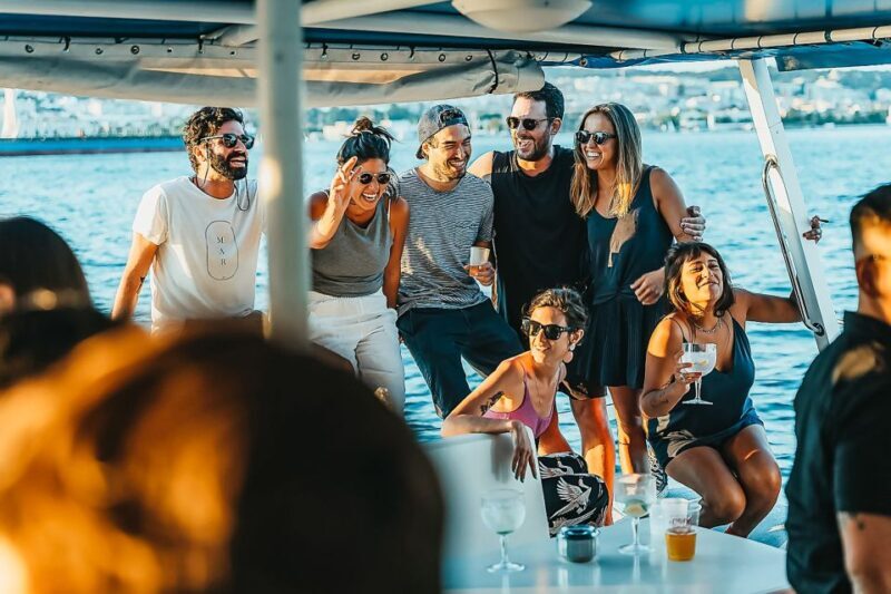 Lisbon: Sunset Catamaran Boat Tour with Music and Drinks - The Practical Aspects: Duration, Cost, and Group Size