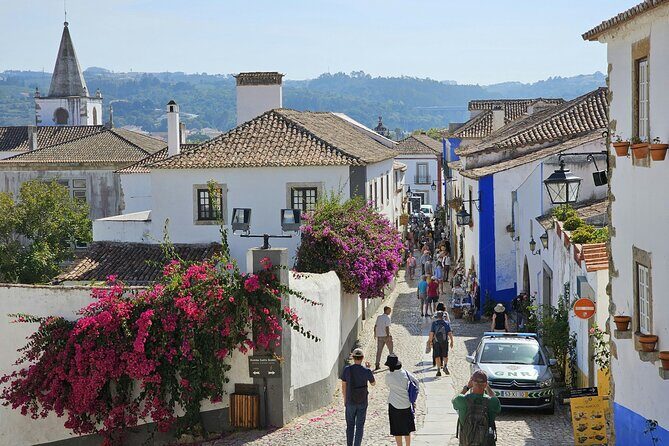 Lisbon to Porto with stops Obidos Nazare Fatima Coimbra Aveiro - Exploring the Itinerary: From Lisbon to Porto with Meaningful Stops