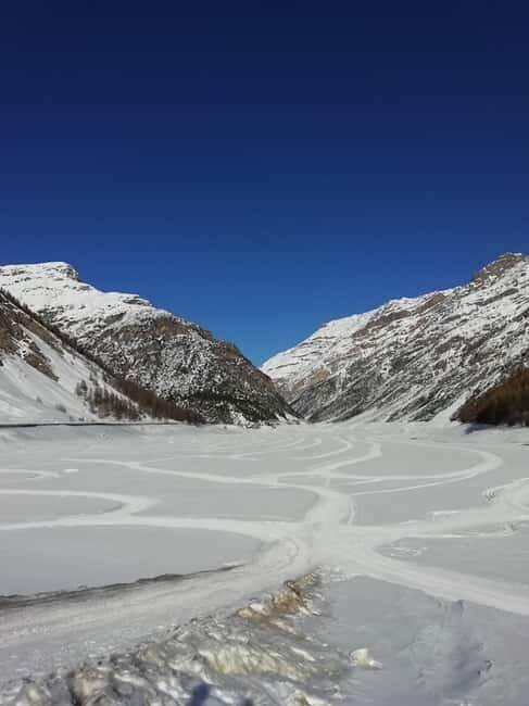 Livigno: Snowmobile Ride on Lake Livigno in the Alps - Key Points: