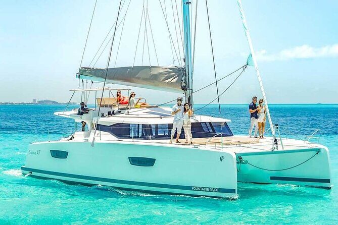 Luxury Catamaran Privilege to Isla Mujeres + Open Bar VIP - Key Points