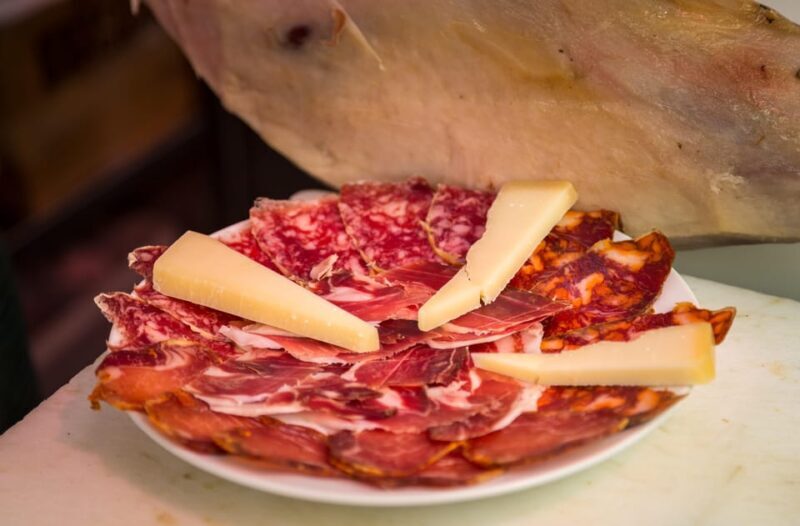 Madrid: Authentic Tapas Evening Tour with a side of History - Key Points