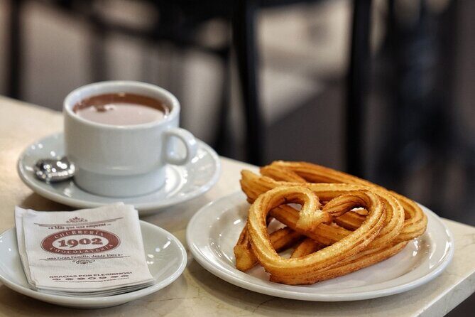 Madrid Bike Tour with Churros and Wine, Ham, and Cheese Upgrade - The Sum Up