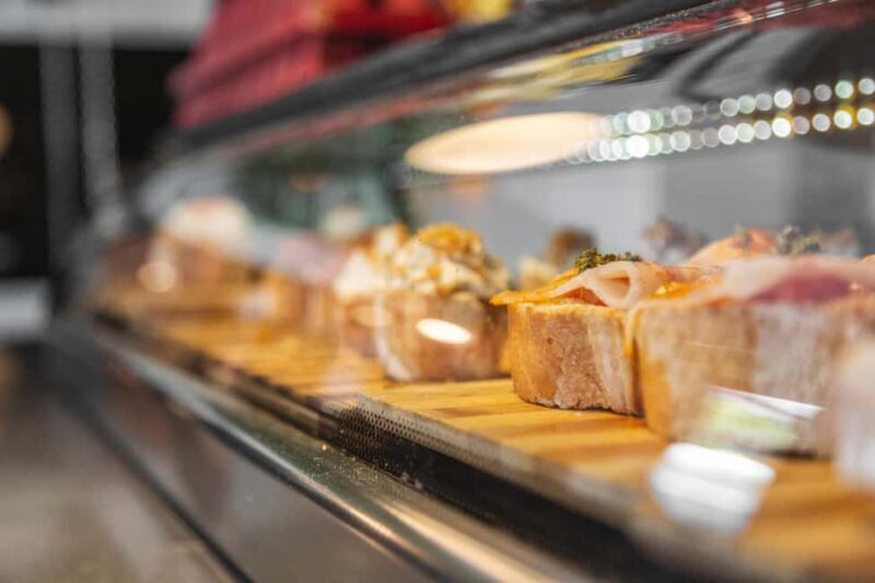 Madrid: Guided Food Tour with Authentic Tapas & Delicacies - The Guides and Their Impact