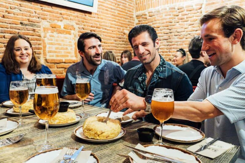 Madrid Guided Food Tour with Tapas and Spanish Wine - Authentic Experiences and Insider Tips