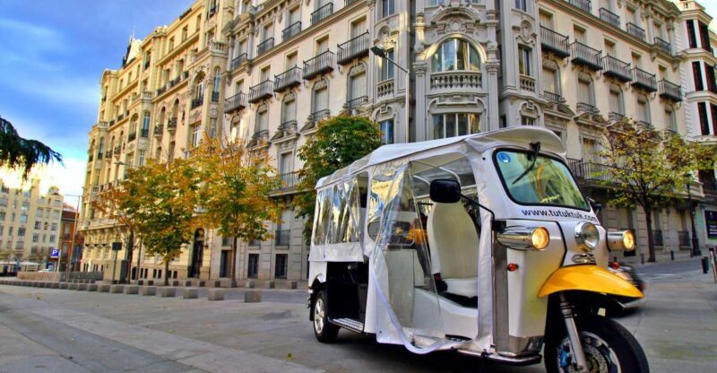 Madrid: Modern tour with Private guide in yellow tuk tuk - Discover Madrid with a Private Electric Tuk Tuk Tour