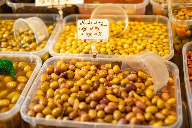 Malaga Food Tour with 12+ Tastings: Tapas, Olive Oil, Ham & More - Exploring Malaga’s Food and Landmarks