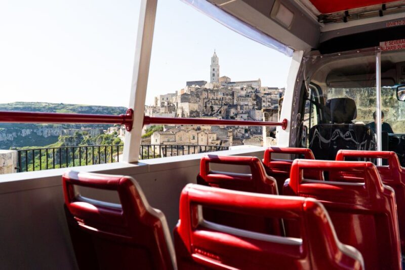 Matera: Open Top Bus Tour with Entrance to Casa Grotta - The Experience of Matera by Night