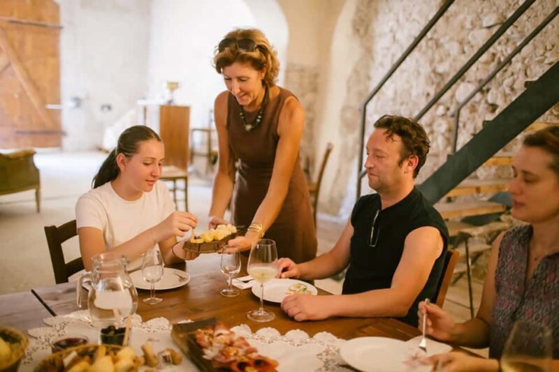 Mezzocorona: Wine Tasting and Cellar Tour with Aperitif - Visiting the Historic Cellar