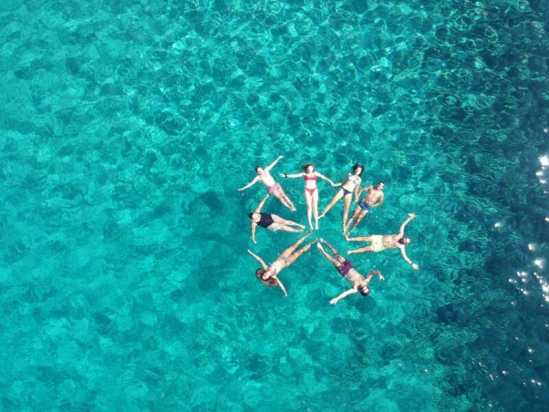 Milos: Full-Day Catamaran Cruise with Paddle Board - The Crew and Guide Experience