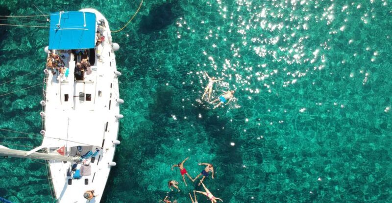 Milos: Milos and Polyaigos Snorkeling and SUP Cruise - Discovering the Milos and Poliegos Snorkeling & SUP Cruise – An Authentic Aegean Adventure