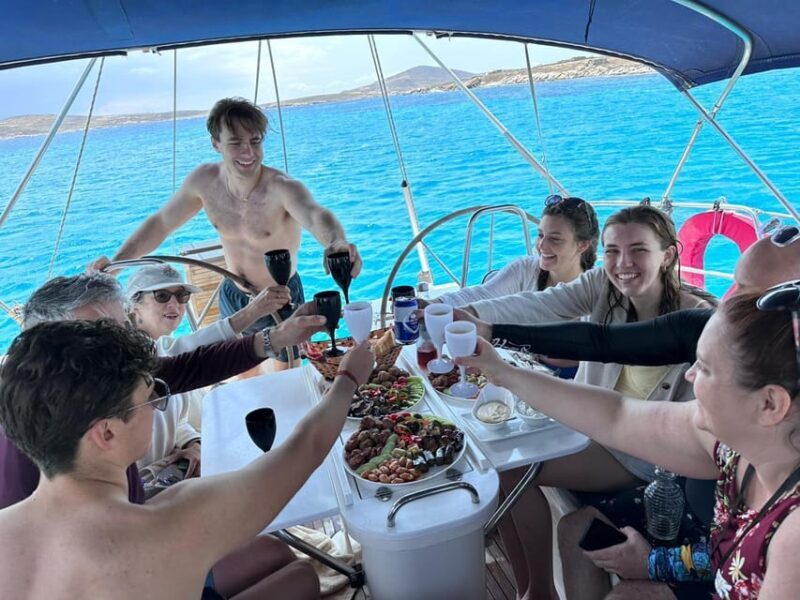 Mykonos: Rhenia Island Sunset Cruise with Transfer and Meal - The Greek Meal and Drinks