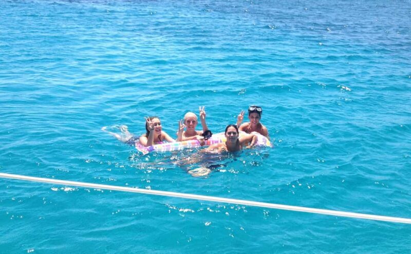 Mykonos: Sunset Sail Cruise to Rhenia, Beach Hopping, Dinner - Key Points