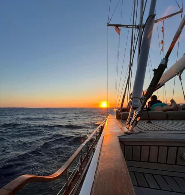 Mykonos: Sunset Sail Cruise to Rhenia, Beach Hopping, Dinner - FAQ