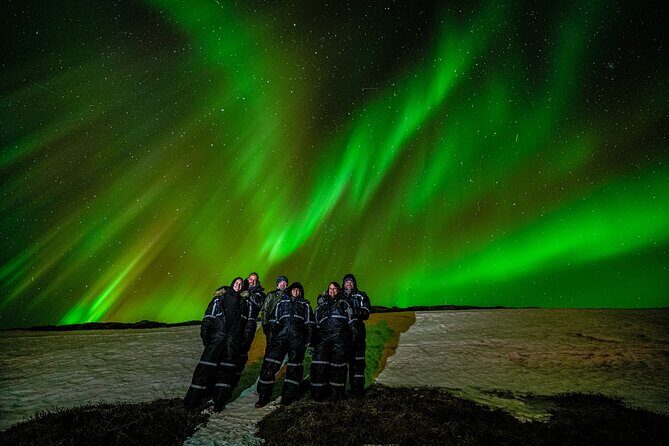 Northern Lights Tour with Photos, Snacks, Warm Snowsuits, Chairs - Key Points