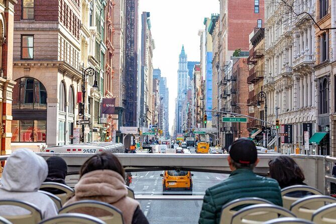 NYC Night Bus Sightseeing Tour with Free Statue of Liberty Cruise - The Sum Up