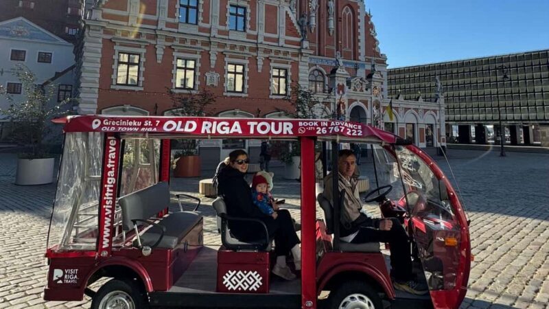 Old Riga Heated E-Bus Tour with Audio Guide & Mulled Wine - Inside the Experience: What to Expect from the Old Riga E-Bus Tour