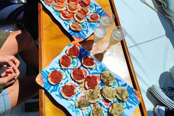 One day excursion on a sailing boat in the Gulf of Alghero - The Sum Up