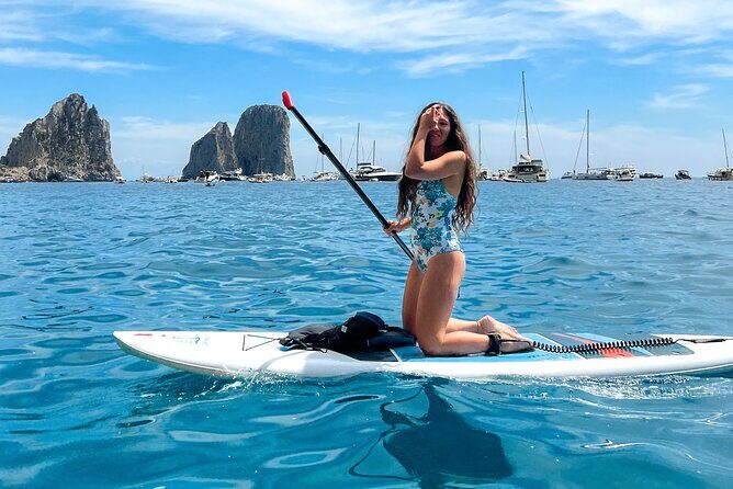 Paddleboard in Capri between caves and beaches. Photos included! - Weather & Cancellation Policy