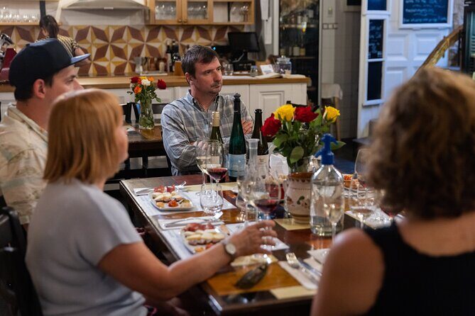 Palace District Evening Culinary, Wine, and History Walk - Key Points