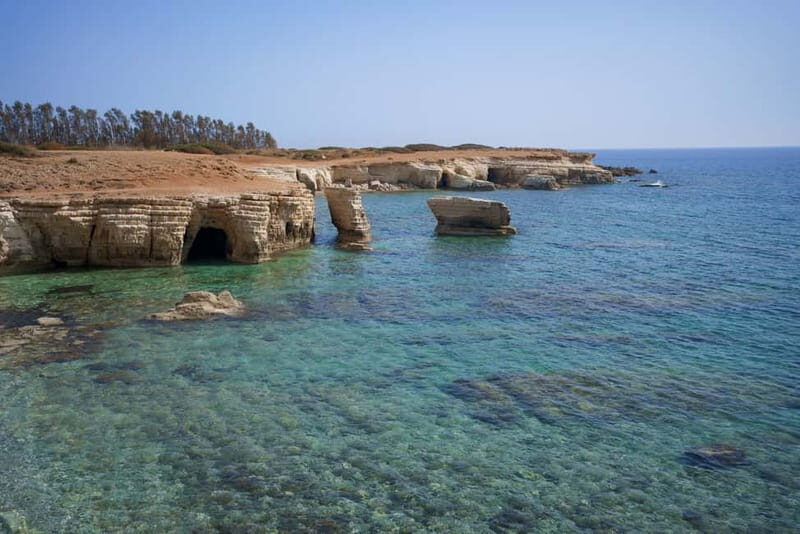 Paphos/Akamas: Blue Lagoon Bus & Boat Tour with Water Slide - Final Stop: Sea Caves and Return Journey