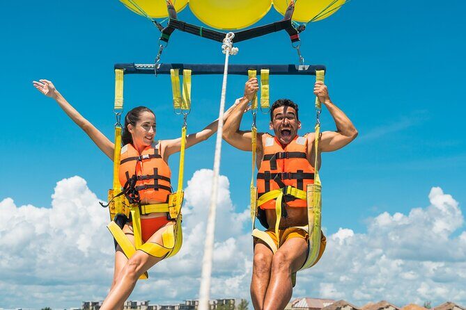 Parasailing & Beach Club with Transportation In Riviera Maya - Key Points