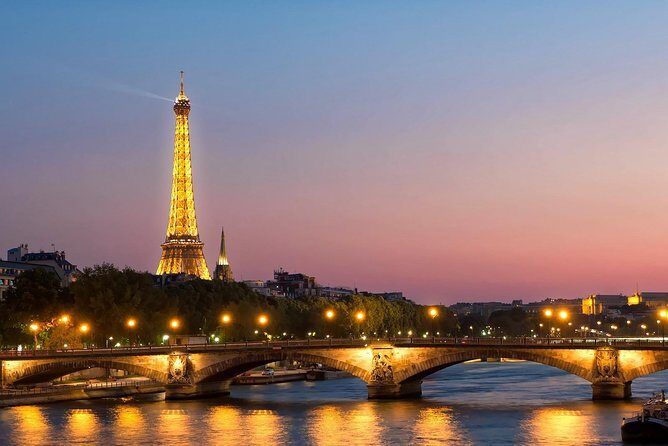 Paris By Night with Seine River Cruise and Roundtrip Luxury Transportation - Key Points