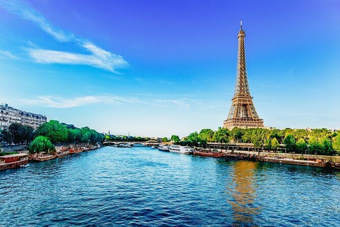 Paris Must Sees from Le Havre including River Cruise & Notre-Dame - First Stop: Arc de Triomphe  