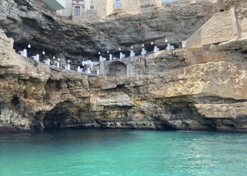Polignano's coast and caves: a boat tour with drinks, swimming, music, and fun - Key Points