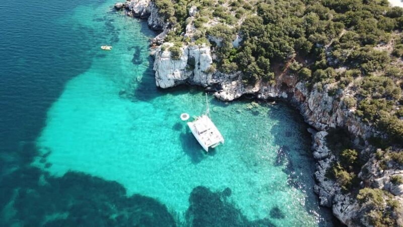 Porto Conte: Half-day catamaran tour with aperitif - The Perfect Introduction to Sardinian Coastline