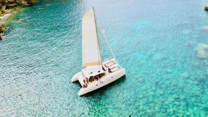 Porto Conte: Sunset catamaran excursion with aperitif - An Overview of the Experience