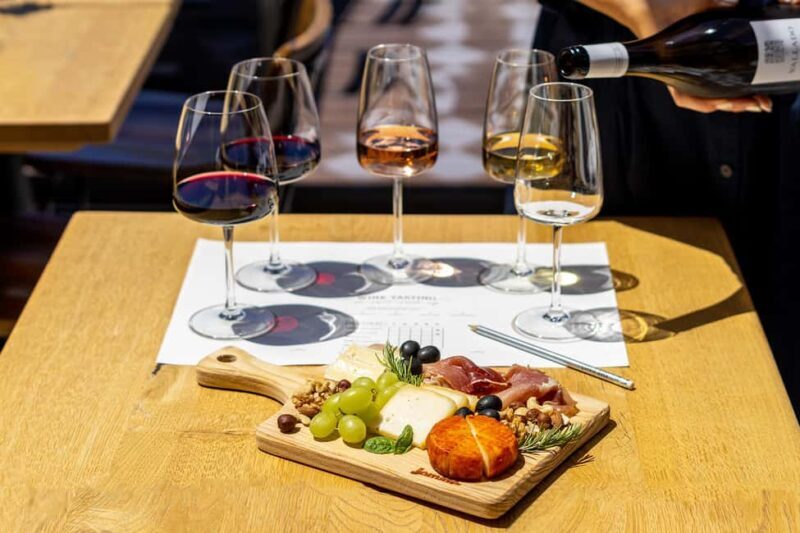 Porto Wine Tasting Experience with Portuguese Tapas Plate - Key Points