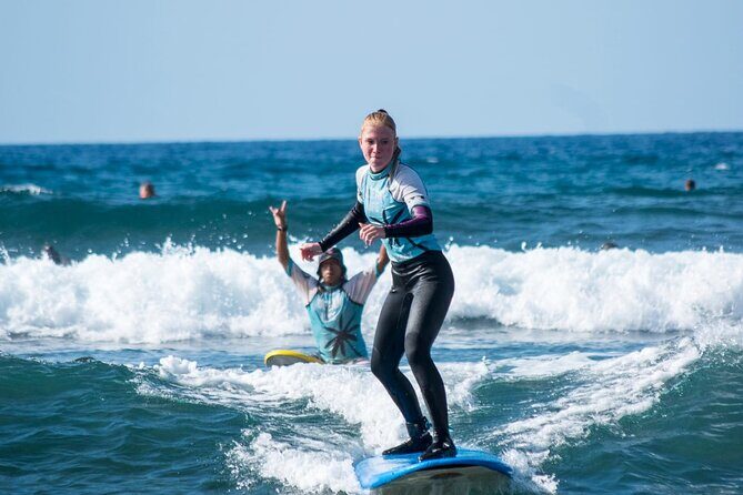 Premium Group Surf (2h)  Only 5 Students, Team Incl (+ 13 years) - The Warm-Up and Land Instruction (15-20 Minutes)