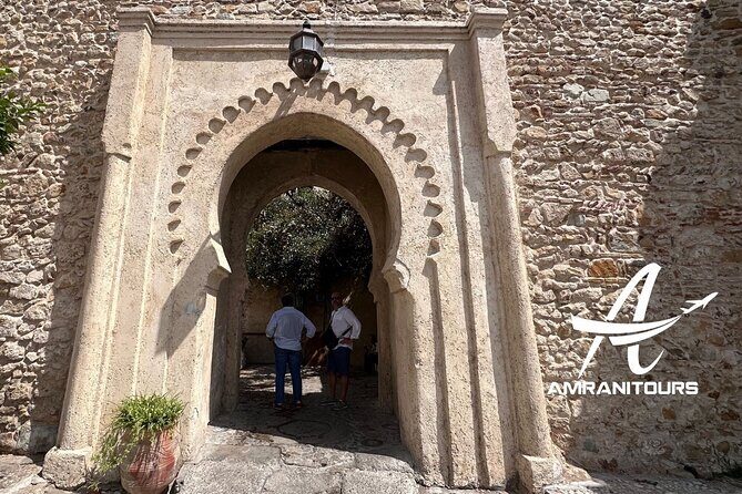 Private Day Trip from Seville to Tangier All Inclusive - Achakkar Beach: Camels and Coastal Charm