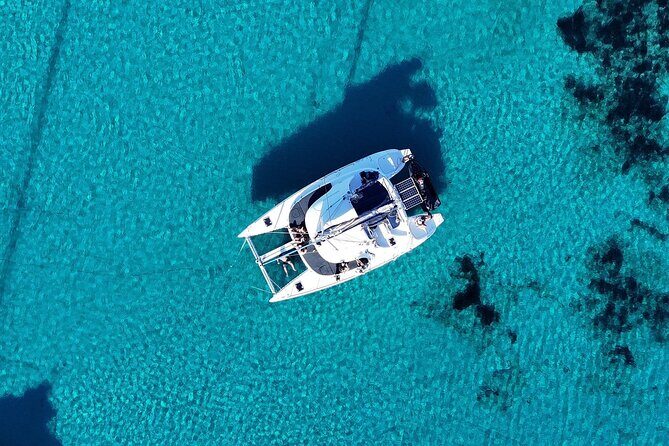 Private Mykonos Catamaran Day Cruise with Meals & Water Toys - The Experience in Detail