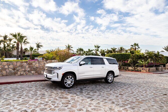 Private SUV Round-Trip from Airport to Hotels in the Corridor - The Sum Up