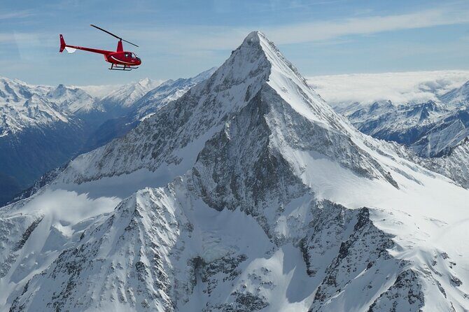 Private Swiss Alps helicopter tour over snow covered mountain peaks and glaciers - A Deep Dive into the Swiss Alps Helicopter Experience