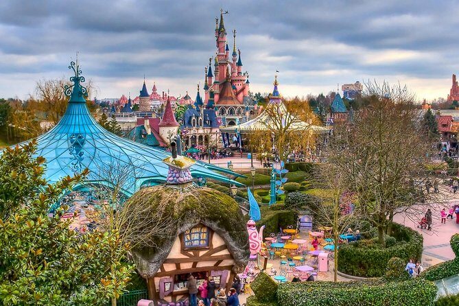 Private Transfer: Disneyland Park or Hotel to Paris by Luxury Van - The Sum Up