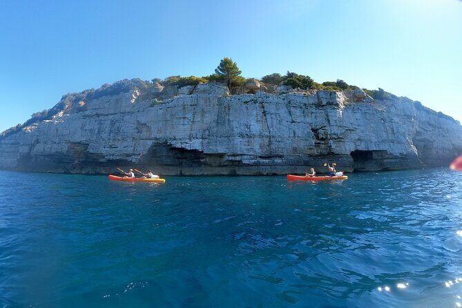Pula Kayak Tour-Cliff jumping,snorkeling& free GoPro pictures - The Sum Up