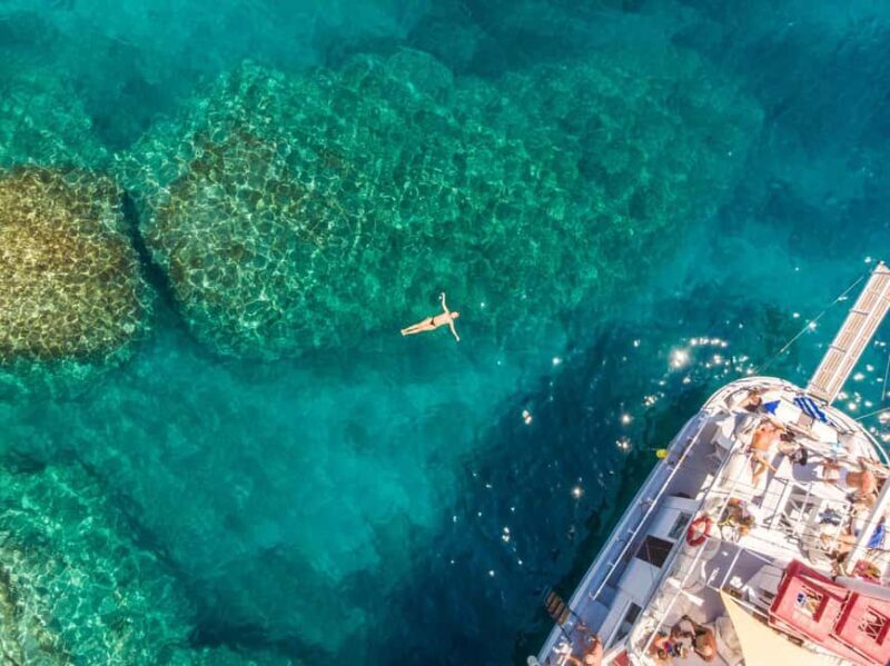 Rhodes: Boat Tour with Snorkeling, Gourmet Buffet & Open Bar - Discovering Rhodes from the Water: An Honest Look at the Boat Tour with Snorkeling, Gourmet Buffet & Open Bar