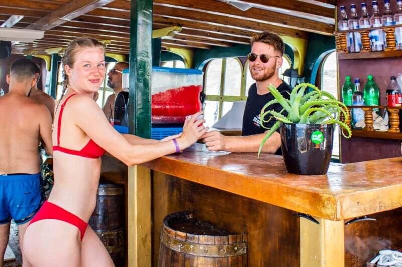 Rhodes: Sunset Cruise with Greek BBQ and Unlimited Drinks - Key Points