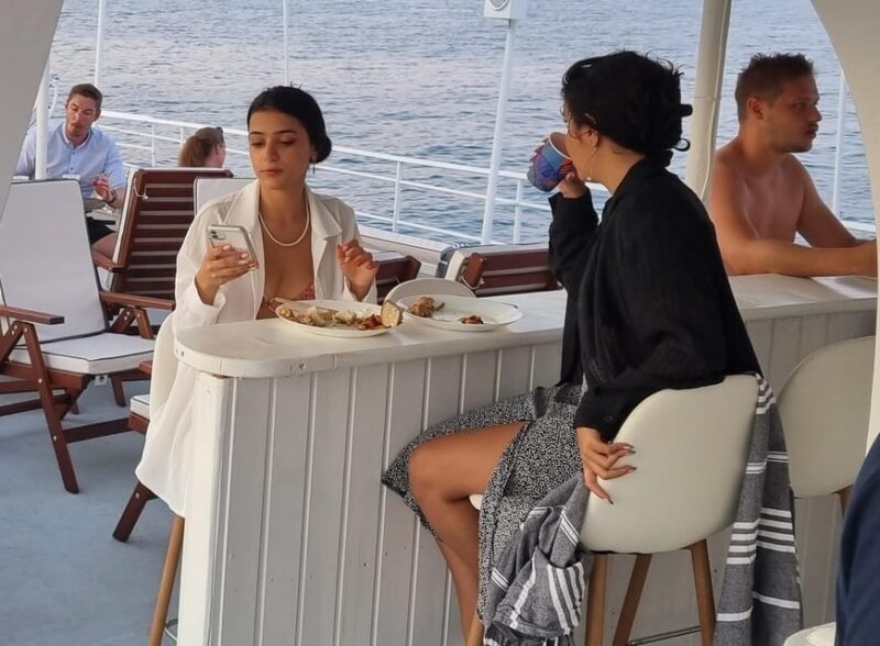 Rhodes: Sunset Cruise with Live Music, Wine & Greek Buffet - The Pros and Cons