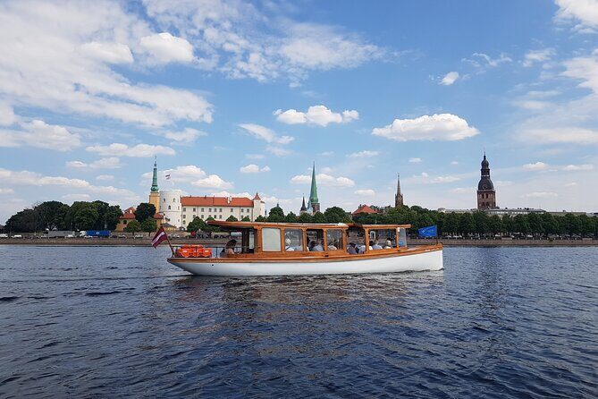 Riga City Canal & Daugava River Premium Boat Tour with Audioguide - Key Points