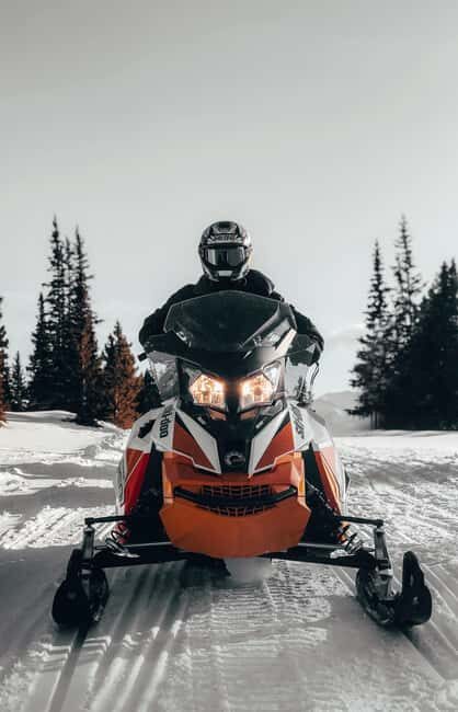 Riga: Snowmobile Adventure with Transfer - Key Points